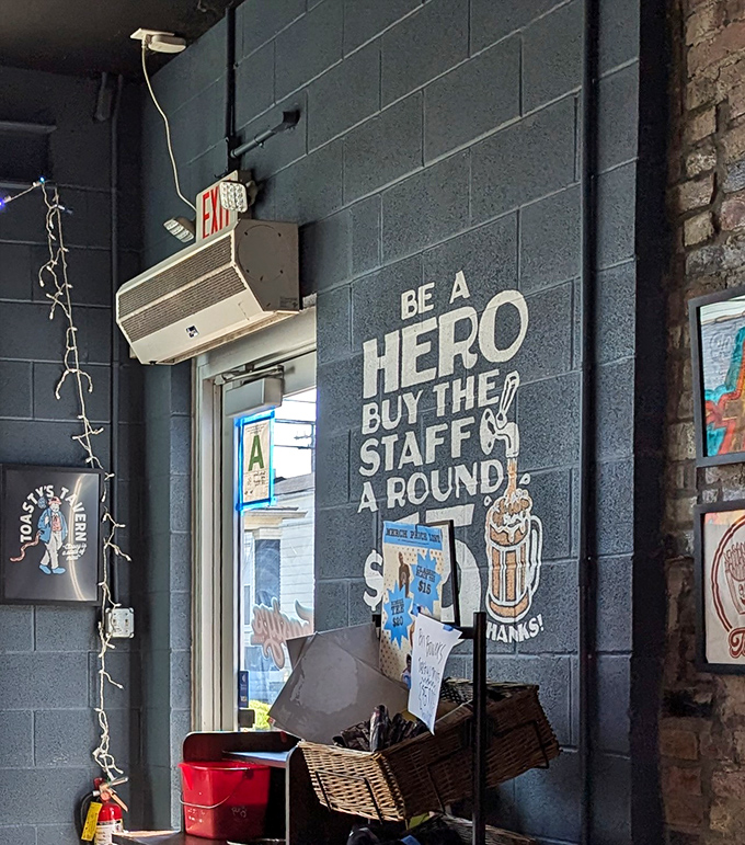 Be a hero, buy the staff a round. This wall says everything about Toasty's community spirit&mdash;a place that encourages kindness alongside killer burgers.