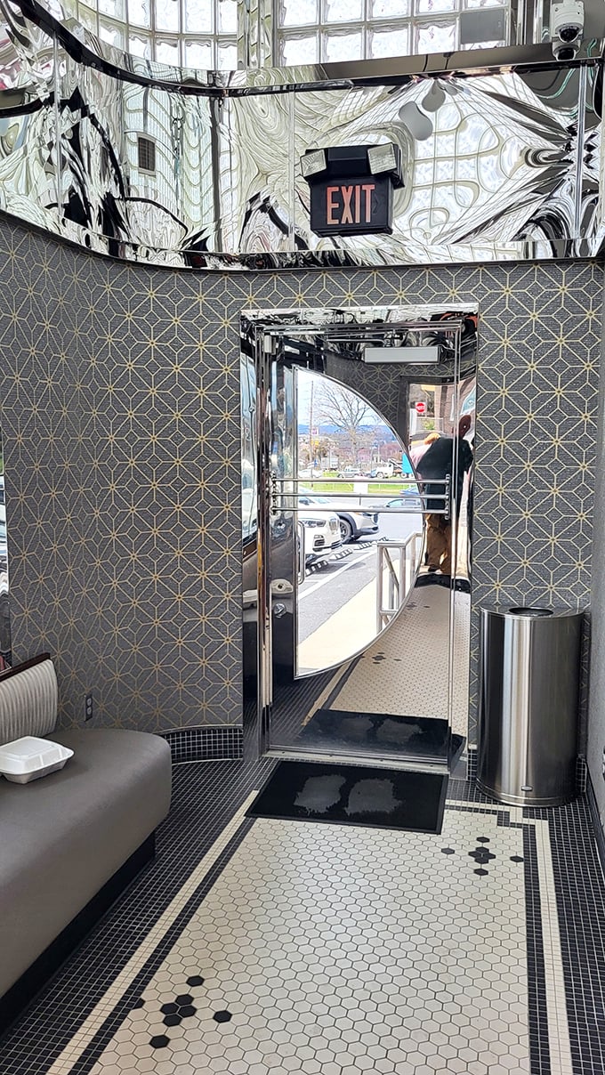 Even the exit at Capitol Diner makes a statement. That mirrored ceiling and patterned floor are giving serious mid-century modern vibes.