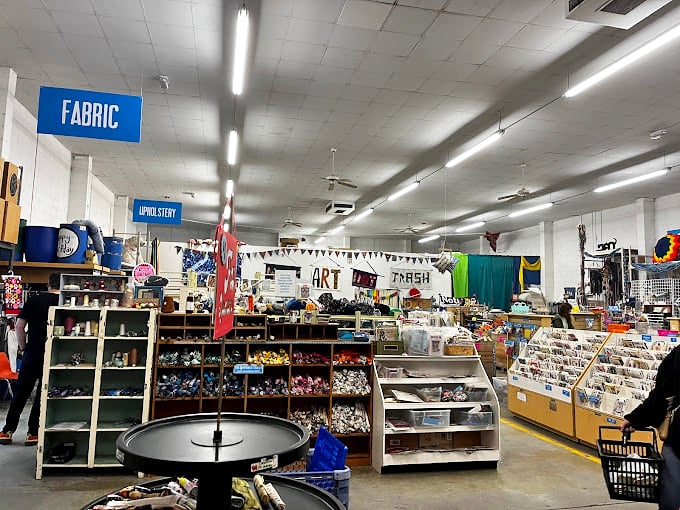 The fabric section could clothe a small nation. Textile enthusiasts move through these aisles like sommeliers in a wine cellar.