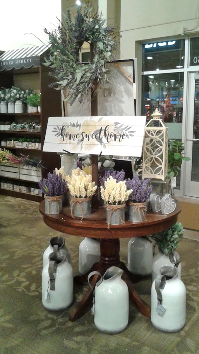 Rustic home d&eacute;cor displays welcome you with farmhouse charm and lavender bundles that scream Pinterest board come alive.