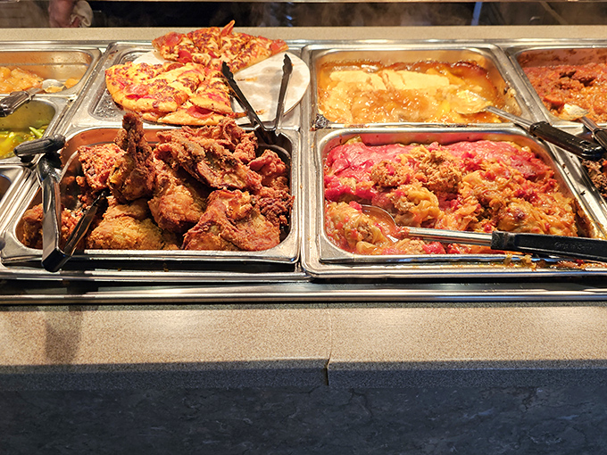 The buffet line&mdash;where decision paralysis meets pure joy. Each steam tray holds the potential to be the highlight of your day.