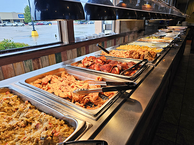 A buffet line that stretches toward the horizon like a delicious mirage. Each tray holds treasures more valuable than gold to a hungry traveler.