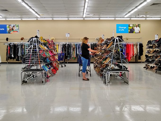 A shopper contemplates her next footwear adventure, surrounded by options that won't kick her budget to the curb.
