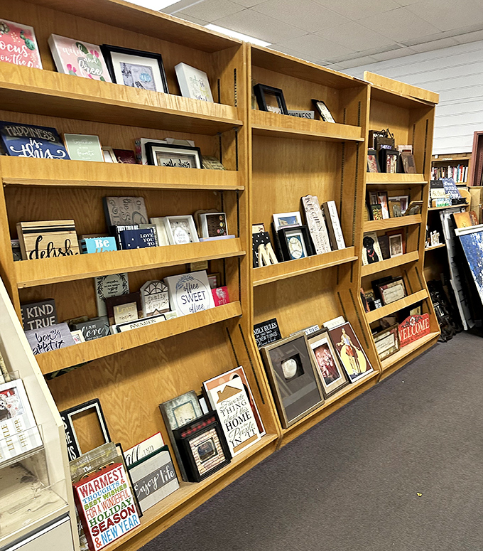 Wall art that ranges from inspirational to questionable, all waiting for the right home. One person's "Live Laugh Love" is another's treasure.