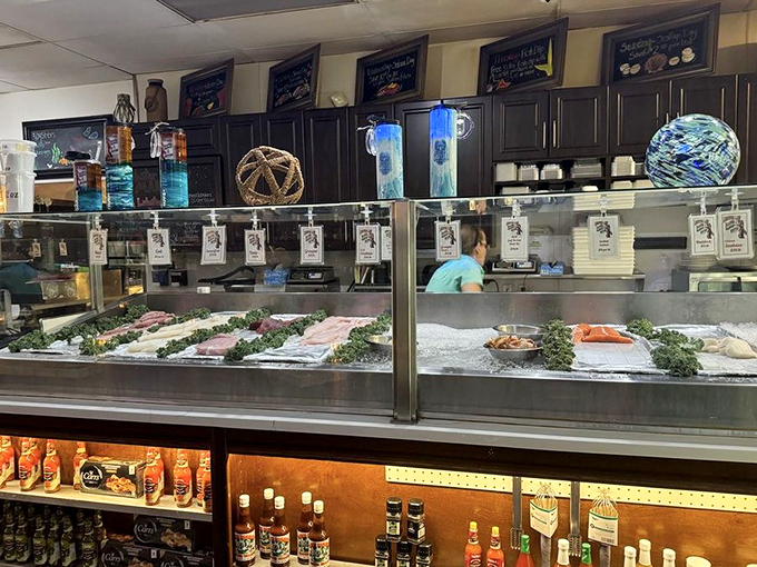 The market display case: where tomorrow's dinner meets today's freshness. Shopping here isn't grocery shopping&mdash;it's curating your own ocean-to-table experience.
