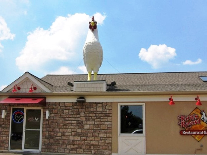 Not content with just a sign, Ron's Roost crowned their building with a giant rooster statue&mdash;subtle advertising was never on the menu.