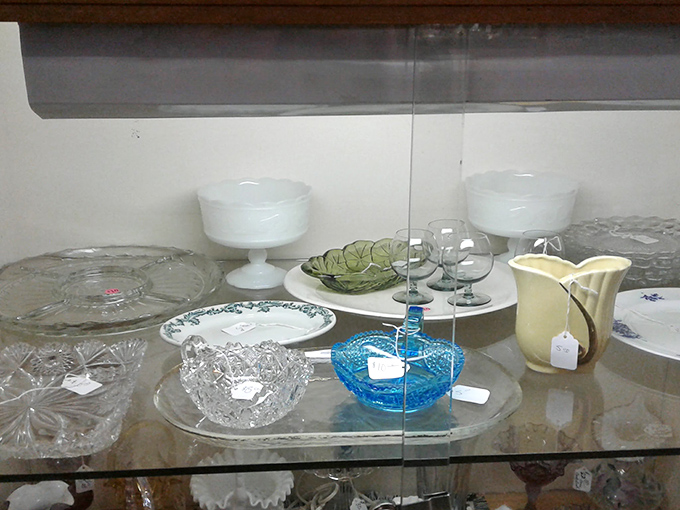 Crystal and milk glass catching light like diamonds on display&mdash;each piece silently bragging about the dinner parties and holiday meals it's witnessed.