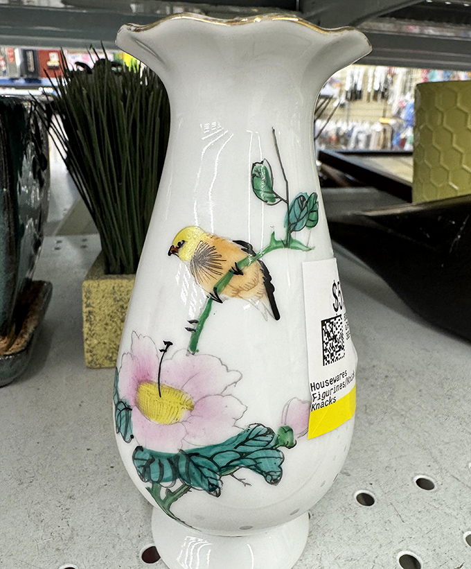Delicate beauty under desert skies! This hand-painted porcelain vase with bird and floral motif brings a touch of elegance at thrift store prices.