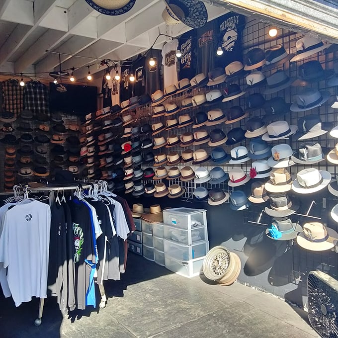 Hat heaven for every head! From cowboy cool to beach-ready straw, this wall of headwear solves bad hair days and sun protection simultaneously.
