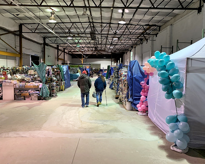 Winter drives the market indoors, where balloon-decorated aisles transform warehouse spaces into wonderlands of discovery.