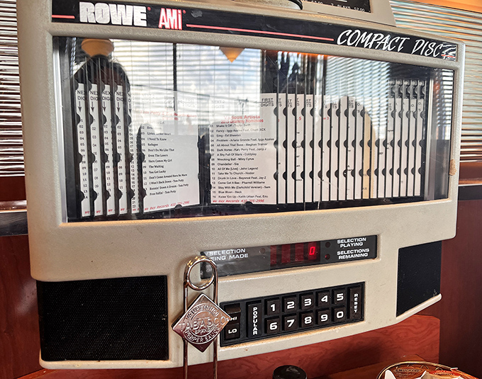 The tabletop jukebox stands ready to provide the soundtrack to your meal &ndash; five decades of hits waiting for your quarter and your nostalgia.