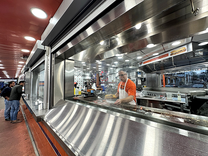 Where the magic happens! Behind the stainless steel counter, sandwich artisans perform their craft with the precision of heart surgeons.