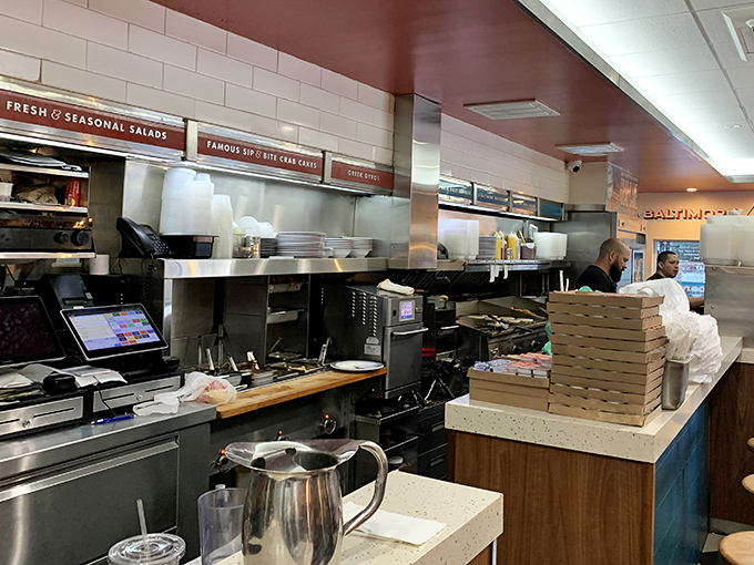 The kitchen&mdash;where breakfast dreams materialize amid the symphony of spatulas and sizzling griddles.