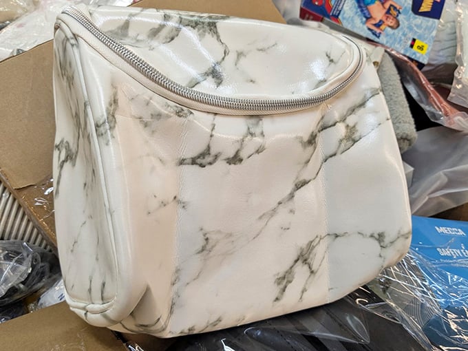 This marble-patterned cosmetic bag didn't get the memo about being discounted&mdash;it's still serving first-class luxury vibes.