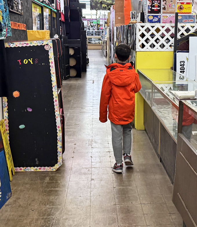 Young explorer navigating the treasure-filled aisles of Dixieland, where childhood wonder meets the thrill of discovery around every corner.