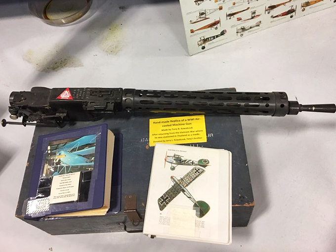 This isn't your typical hunting rifle. The aircraft machine gun reminds us that the friendly skies weren't always so friendly. History with teeth and a trigger.