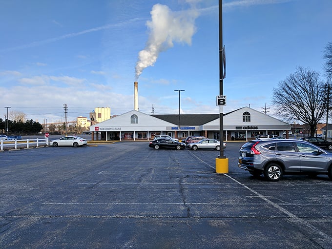 Even the parking lot reveals the scale of this shopping mecca. That factory smokestack in the background is probably producing more designer discounts as we speak.