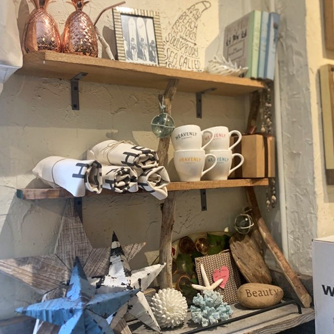 Merchandise corner that tempts you to bring home a mug, because drinking coffee from anything else will feel like a downgrade after this.