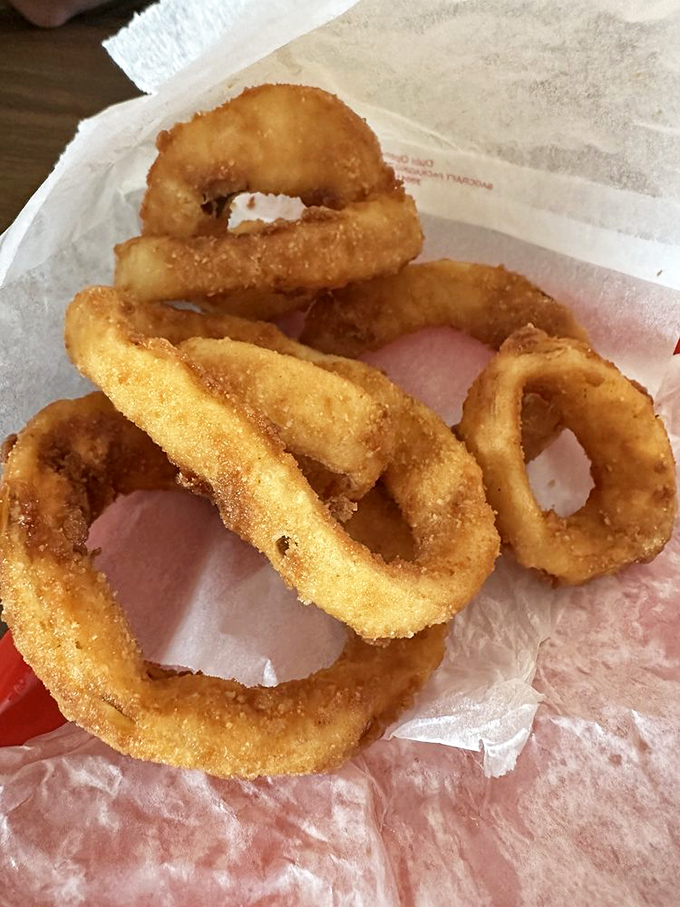 Onion rings with architectural integrity&mdash;substantial enough to satisfy, delicate enough to shatter pleasingly with each bite.