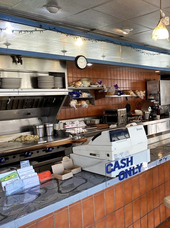 The "Cash Only" sign &ndash; a charming reminder you've entered a place where the food matters more than payment convenience.