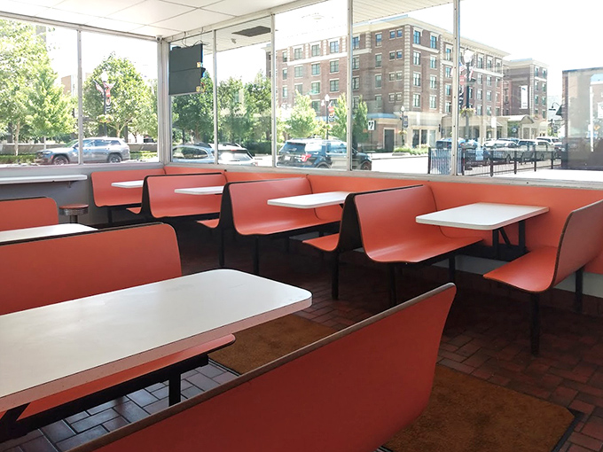 Empty booths waiting for the lunch rush&mdash;each one a front-row seat to the floor-to-ceiling windows showcasing downtown Findlay.