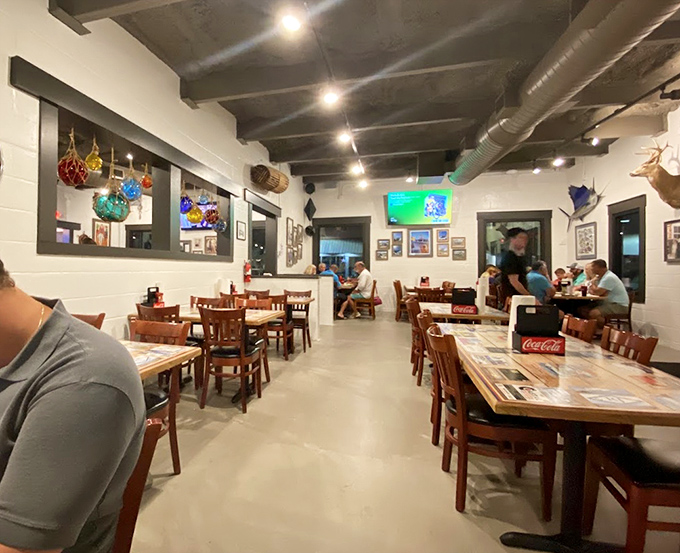 White walls, wooden tables, and nautical touches create the perfect canvas for seafood memories. No pretension, just the promise of honest Gulf cooking.