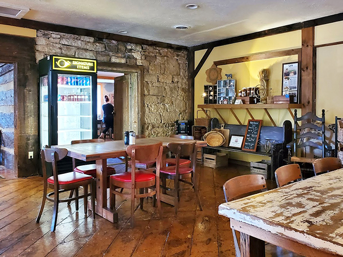 Stone walls frame wooden tables in a space that feels both centuries old and perfectly timeless. Rustic elegance without a hint of pretension.