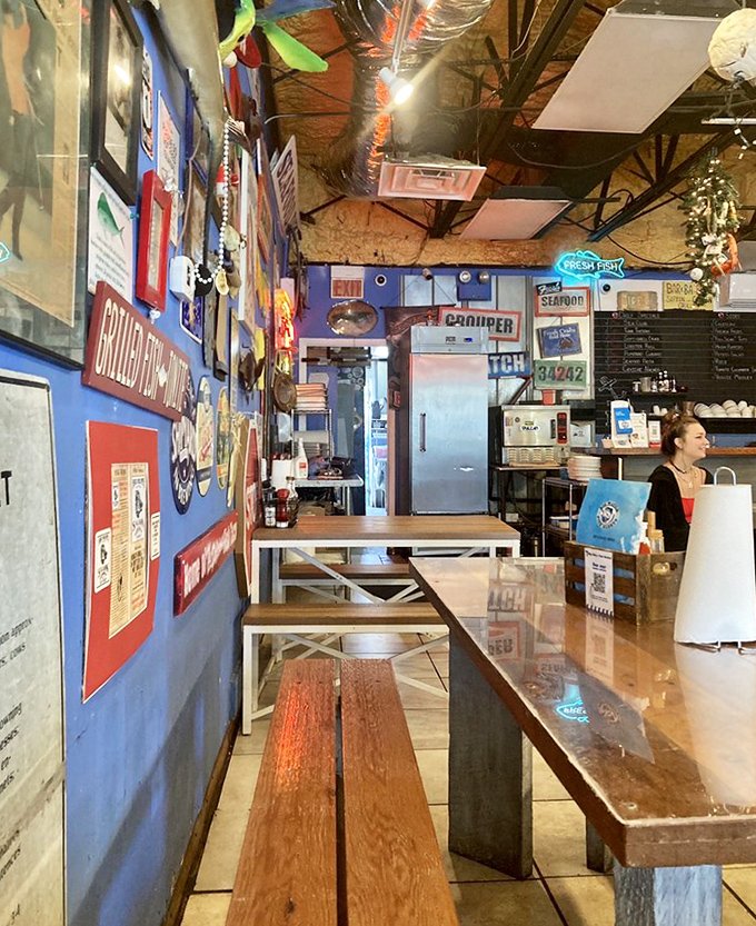 Rustic wooden tables and nautical blue walls create the perfect backdrop for seafood feasts that would impress even the pickiest mermaid.