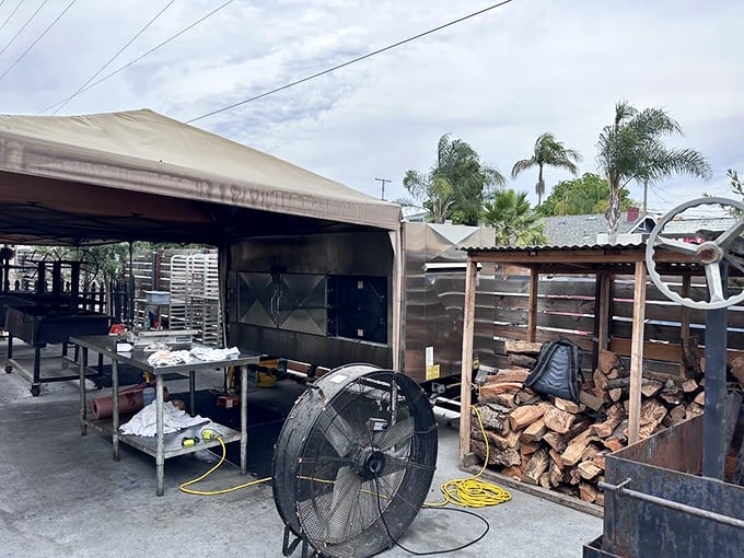 Behind the scenes where smoke and fire work their transformative magic. This isn't cooking; it's alchemy with wood, metal, and meat.