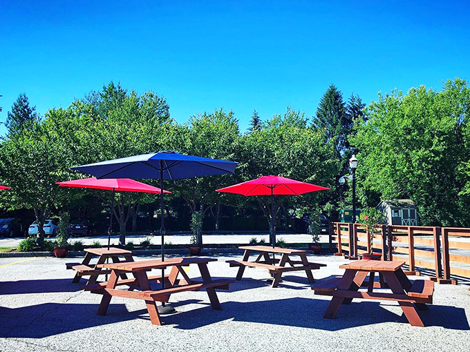 Outdoor seating where summer memories are made. Picnic tables under cheerful umbrellas invite you to linger longer over that second coffee.