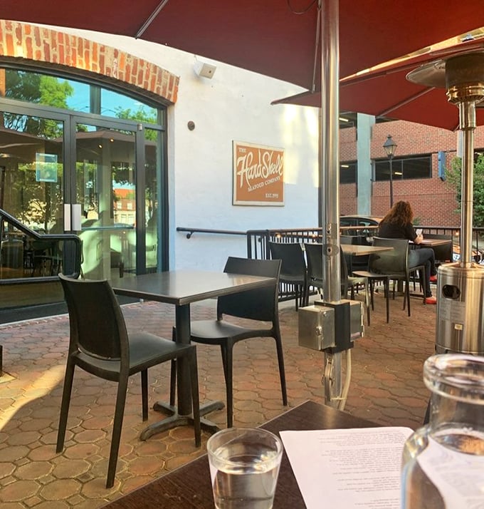 Outdoor seating on historic cobblestones where you can enjoy premium seafood while Richmond's charming past strolls casually by your table.