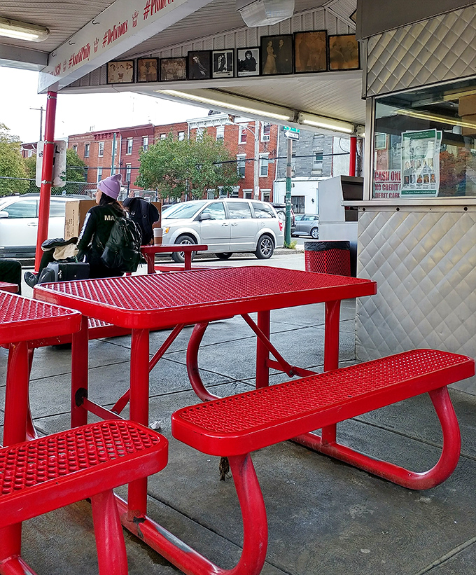 These red tables have hosted more meaningful conversations and food epiphanies than most five-star restaurants. Democracy in dining at its finest.