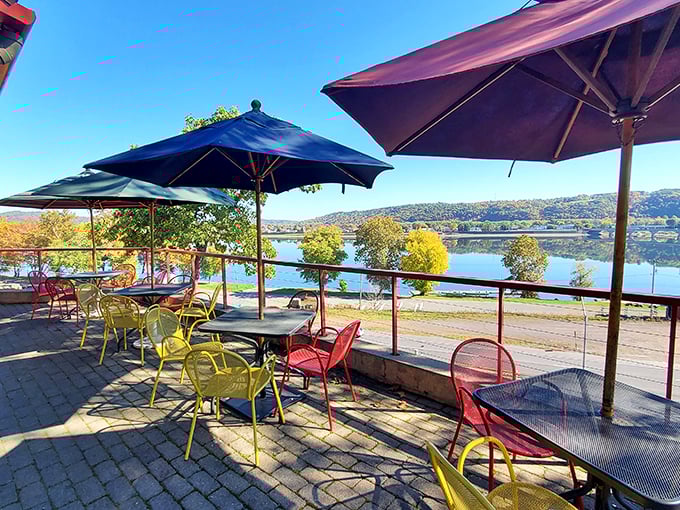Sunshine and smoked meats &ndash; nature's perfect pairing. This colorful patio offers al fresco dining with a side of spectacular river views.