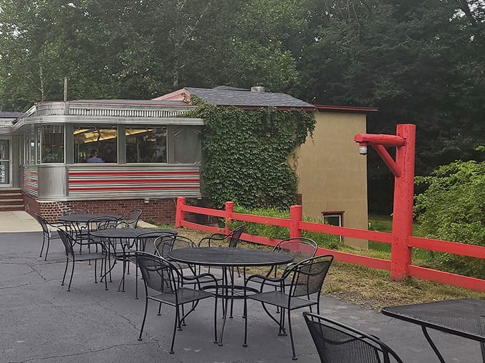 Al fresco dining, diner-style. Those red fence posts aren't just decorative &ndash; they're holding back the forest from reclaiming this temple of comfort food.