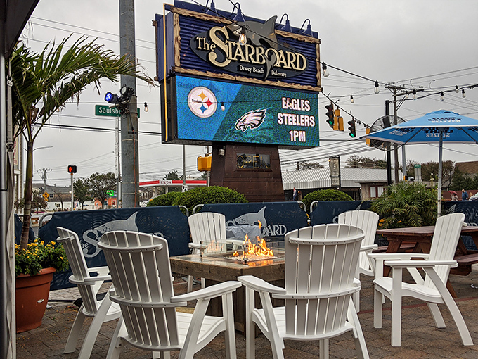 The outdoor patio with Adirondack chairs gathered around a fire pit&mdash;where strangers become friends and friends become family.
