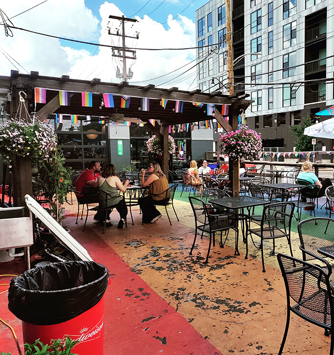 The patio offers urban al fresco dining under rainbow banners, where pizza tastes even better with a side of people-watching.