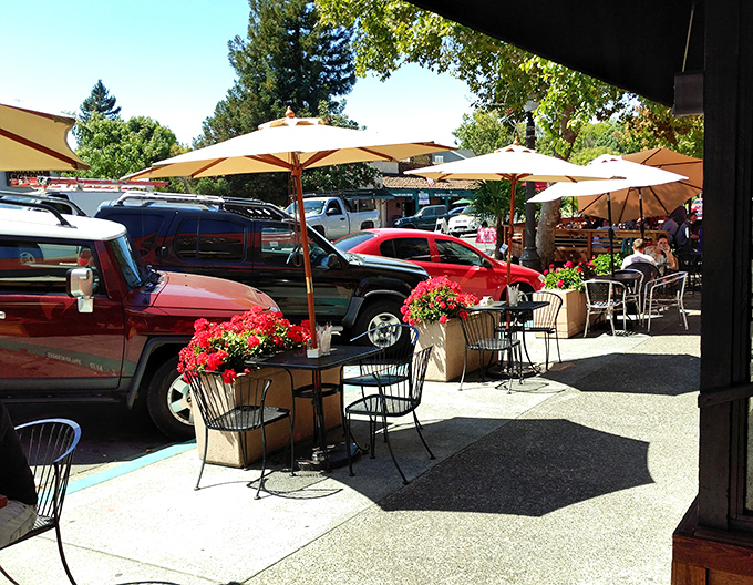 Outdoor seating that captures California's perfect weather, with umbrellas standing guard against the rare moments when the sun gets too enthusiastic.