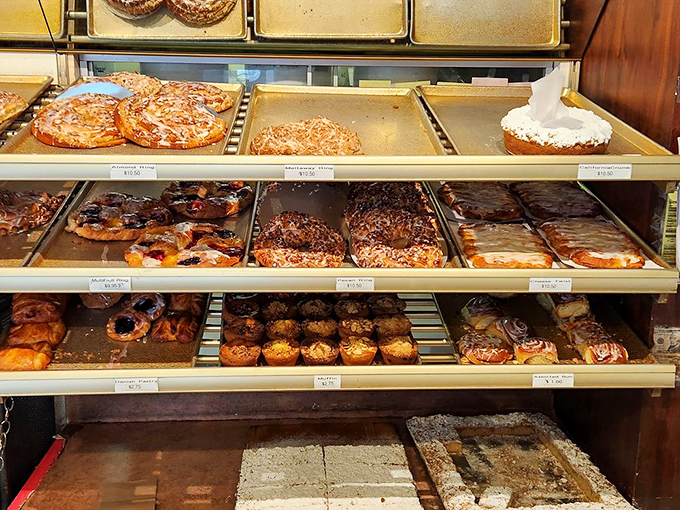 The pastry case of dreams&mdash;where donuts, Danish, and other delights await adoption. Each shelf a different chapter in the story of "Why Diets Fail."