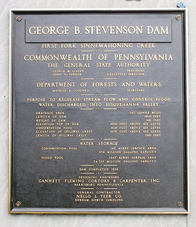 History cast in bronze—the George B. Stevenson Dam plaque reminds us that even our wilderness escapes were carefully engineered for our enjoyment.