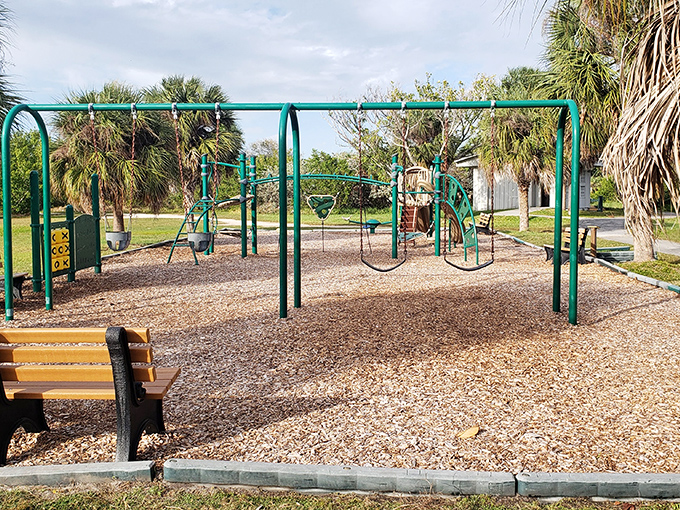 Swings and slides nestled among palms &ndash; where kids burn energy and parents secretly wish the equipment came in adult sizes.