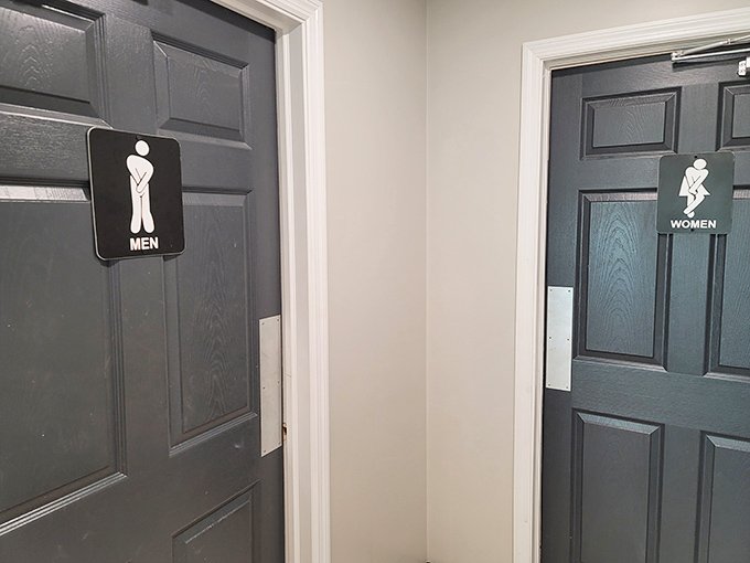 Even the restroom signs have personality at LongBill's&mdash;a small detail that shows they don't take themselves too seriously, just their food.