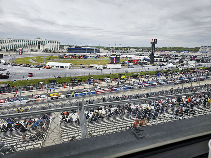 Race day transforms Dover Speedway into Delaware's most exciting temporary city, with Miles serving as the concrete mayor.