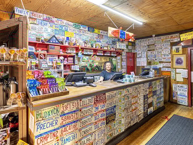 The license plate counter isn't just decorative—it's visual proof that people will cross state lines for exceptional catfish and Southern hospitality.