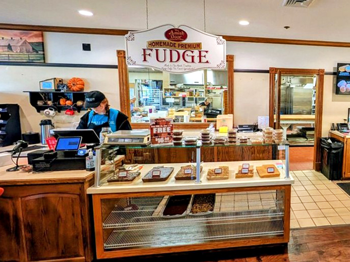 The fudge counter sits near the register, strategically positioned to test your resolve when you're already stuffed beyond reasonable capacity.