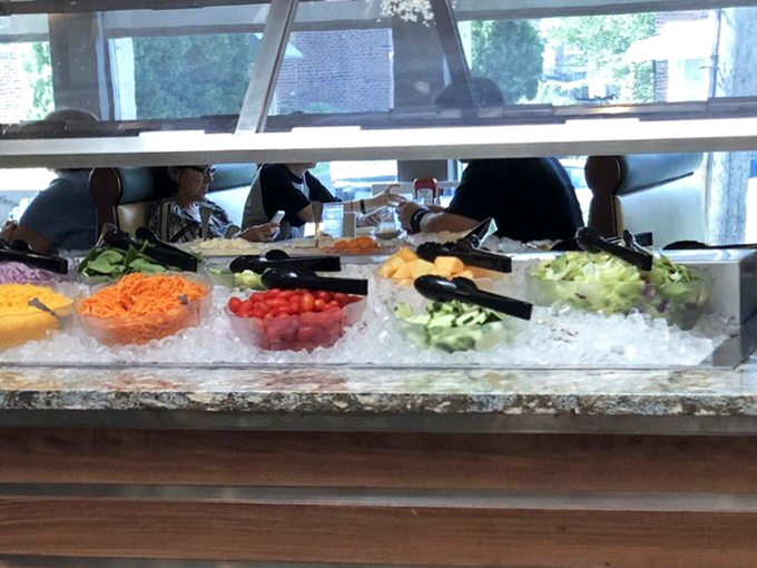 Fresh vegetables on ice, waiting patiently to make your meal healthier while you contemplate ordering that extra side.
