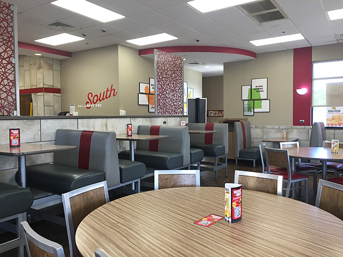 The dining room says "stay awhile" with its comfortable booths and tables where countless Alabama stories have been shared over biscuits.