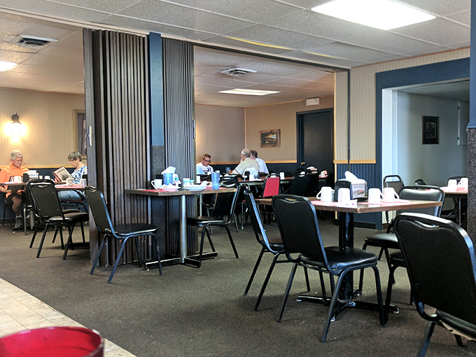 The dining room where strangers become neighbors. These tables have heard more local news than the town newspaper. 