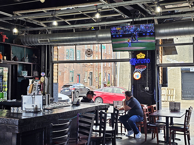 When the garage doors roll up, the line between "inside" and "outside" blurs, creating the perfect urban oasis for sandwich contemplation.