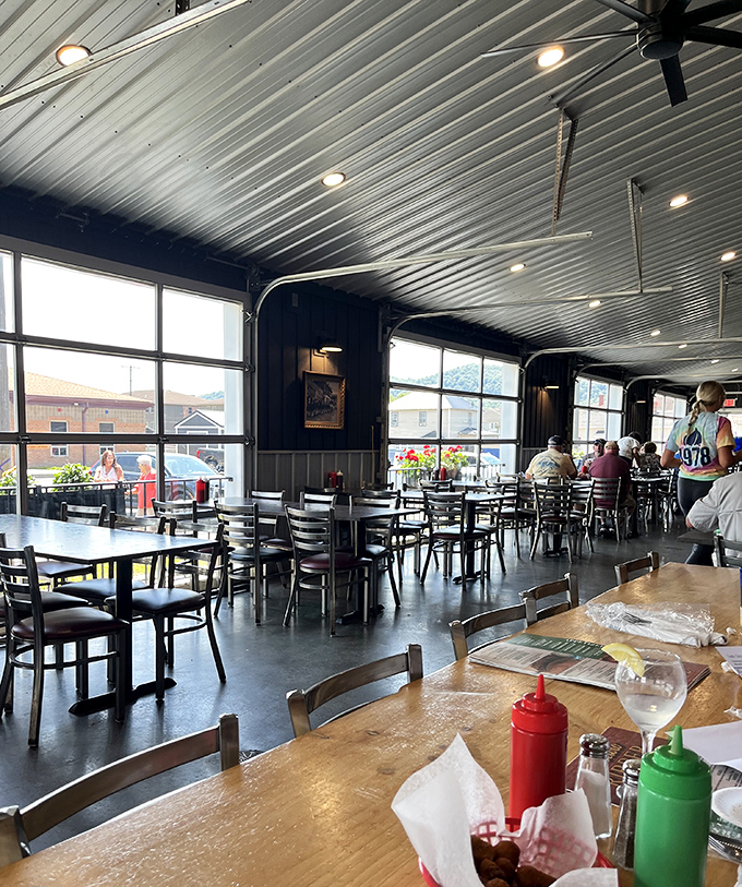 Exposed brick, corrugated metal ceilings, and comfortable seating create an industrial-casual vibe that just works perfectly here.