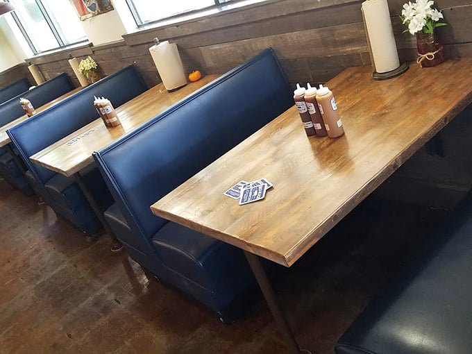 Blue booths and wooden tables&mdash;barbecue's natural habitat. The sauce bottles stand ready, like little soldiers awaiting their delicious duty.